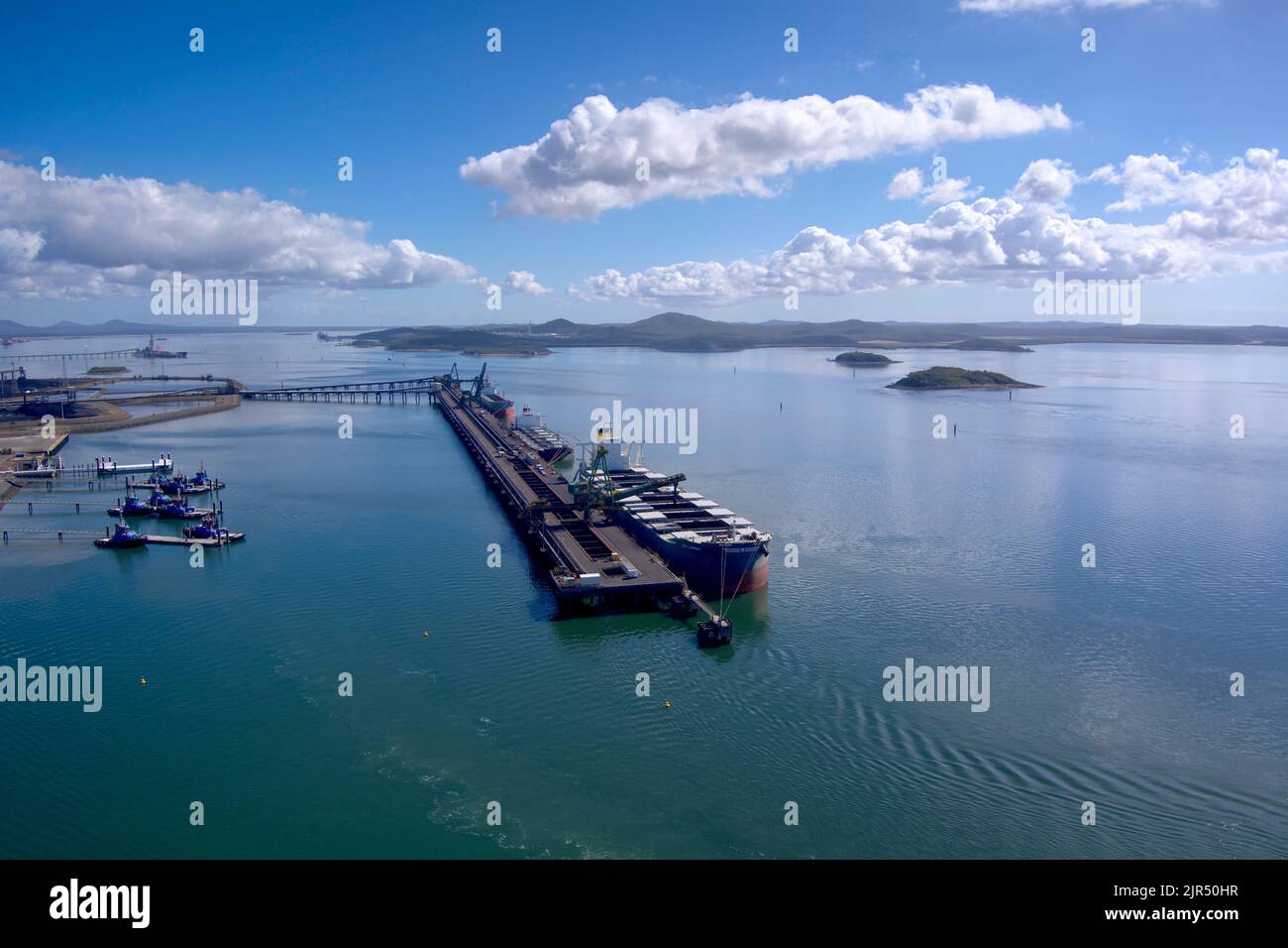 Aerial of coal export wharfs RG Tanna Coal Terminal at Port of ...