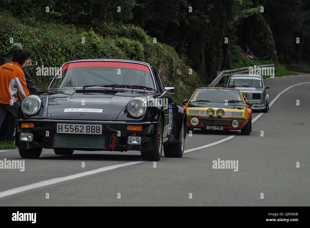 A modern Germany fast car Porsche 911 driving in track Stock Photo - Alamy