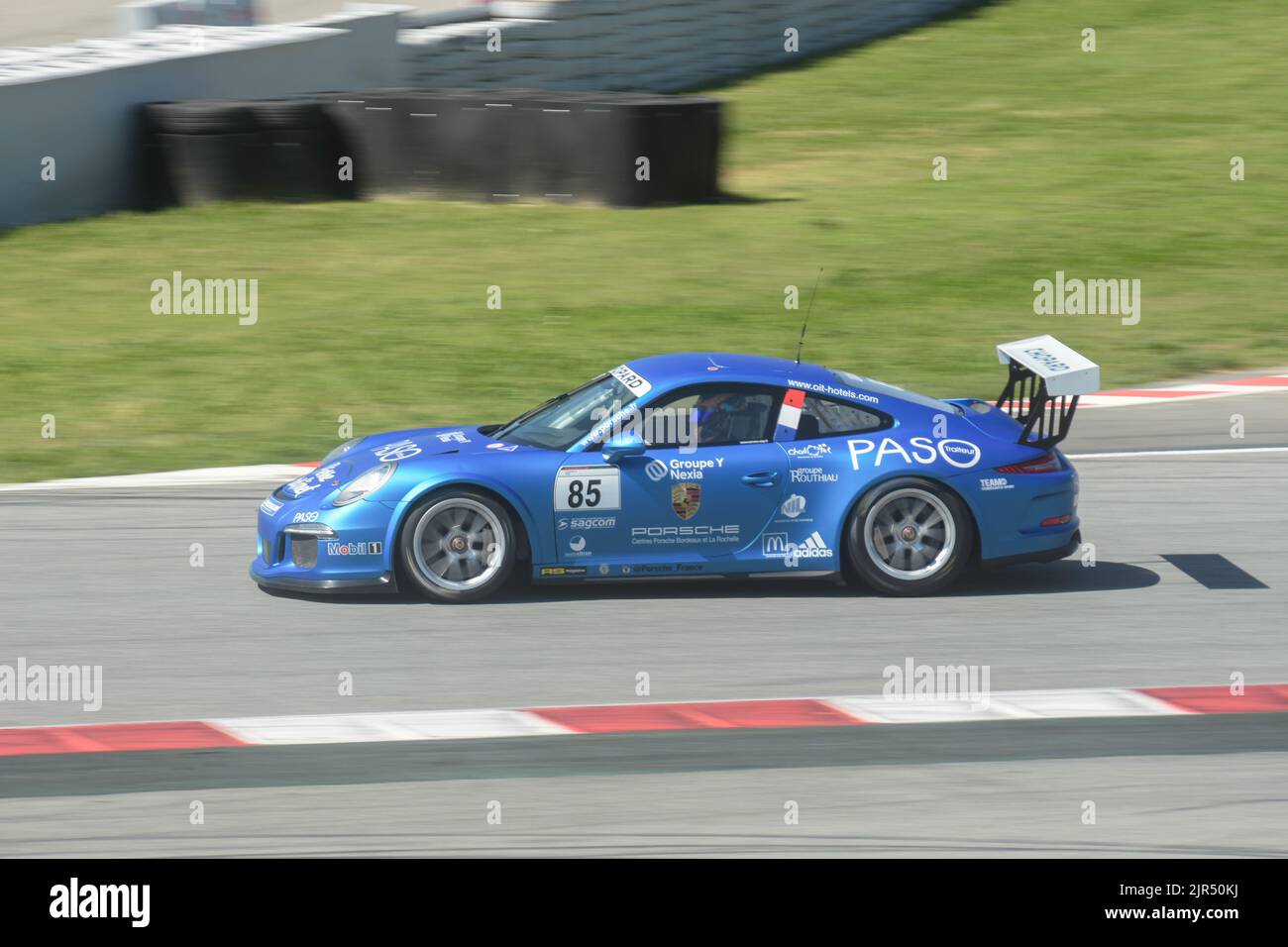 A modern Germany fast car Porsche 911 driving in track Stock Photo - Alamy