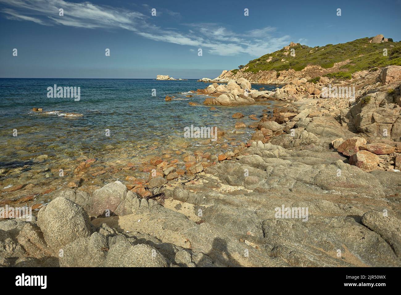 Rocky panorama of Cala Sa Figu beach in Sardinia: rocks and rocks meet ...
