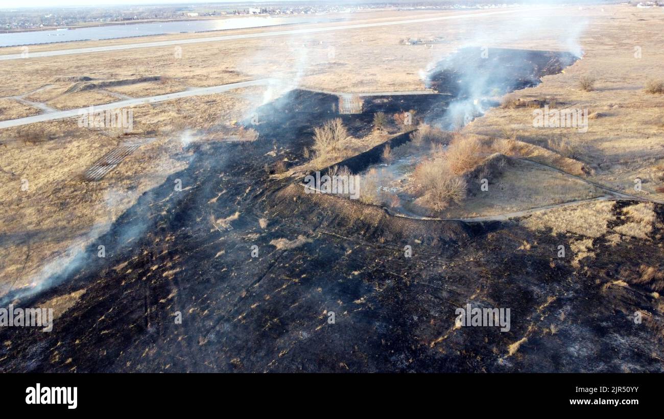 Aerial View Burning Dry Grass. Open Flames of Fire and Smoke. Yellow ...