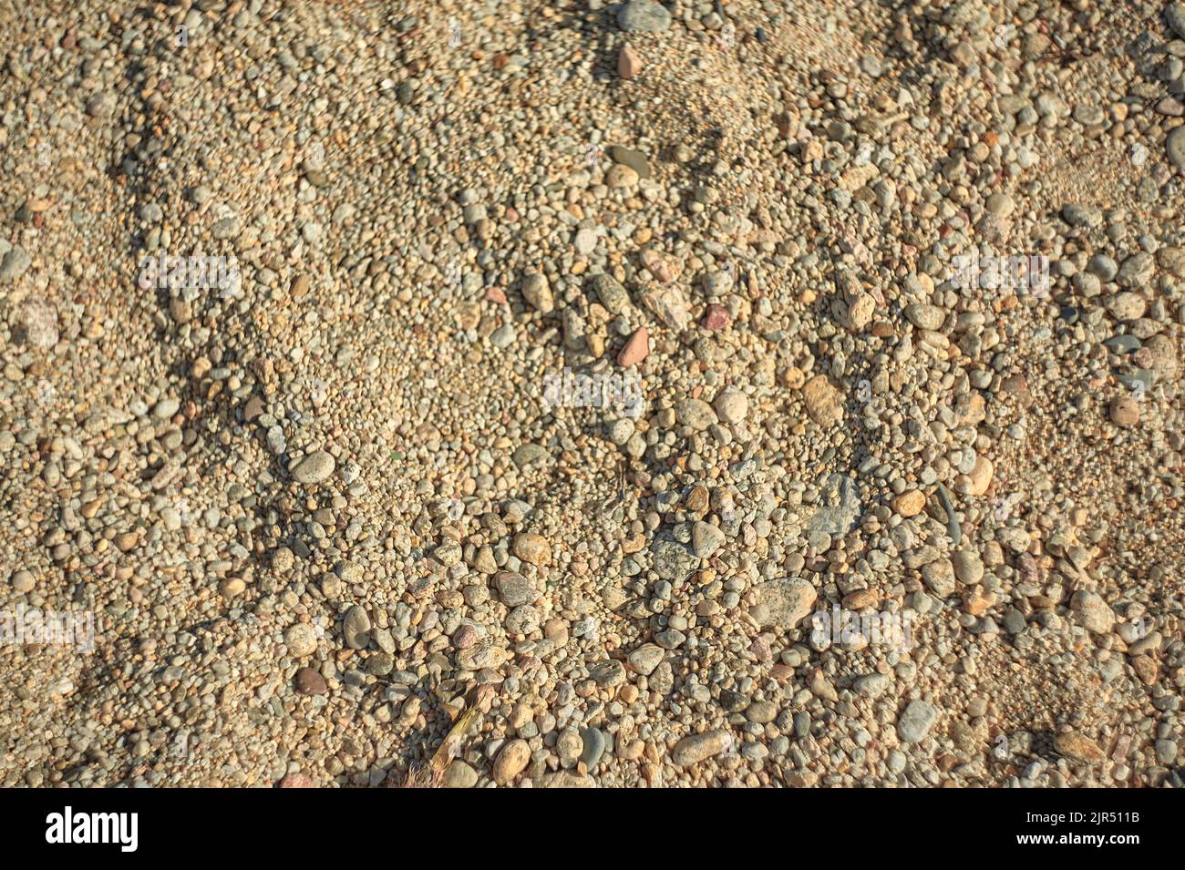 Texture of pebbles and sand typical of southern Sardinia in Italy in ...