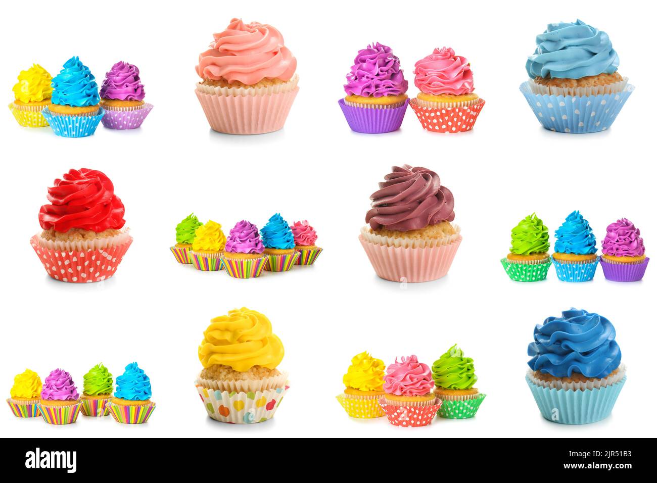 Set of colorful cupcakes isolated on white Stock Photo - Alamy