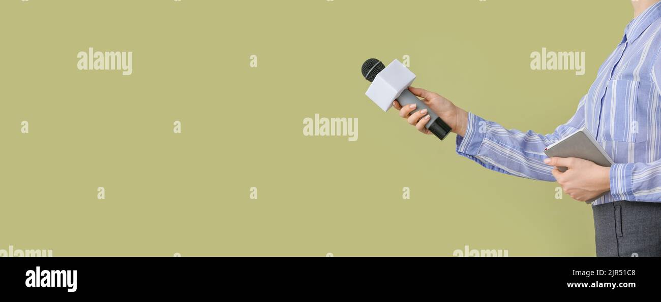 Journalist with microphone on color background with space for text ...