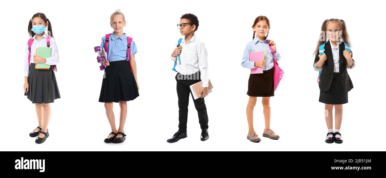 Group of cute little school children on white background Stock Photo ...