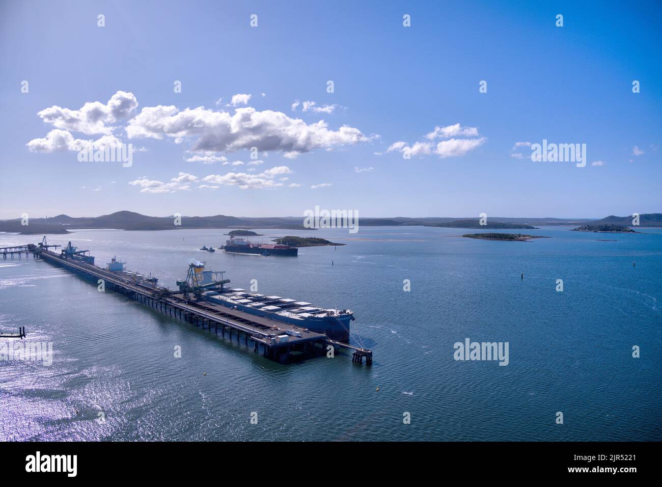 Aerial of coal export wharfs at Port of Gladstone Queensland Australia ...