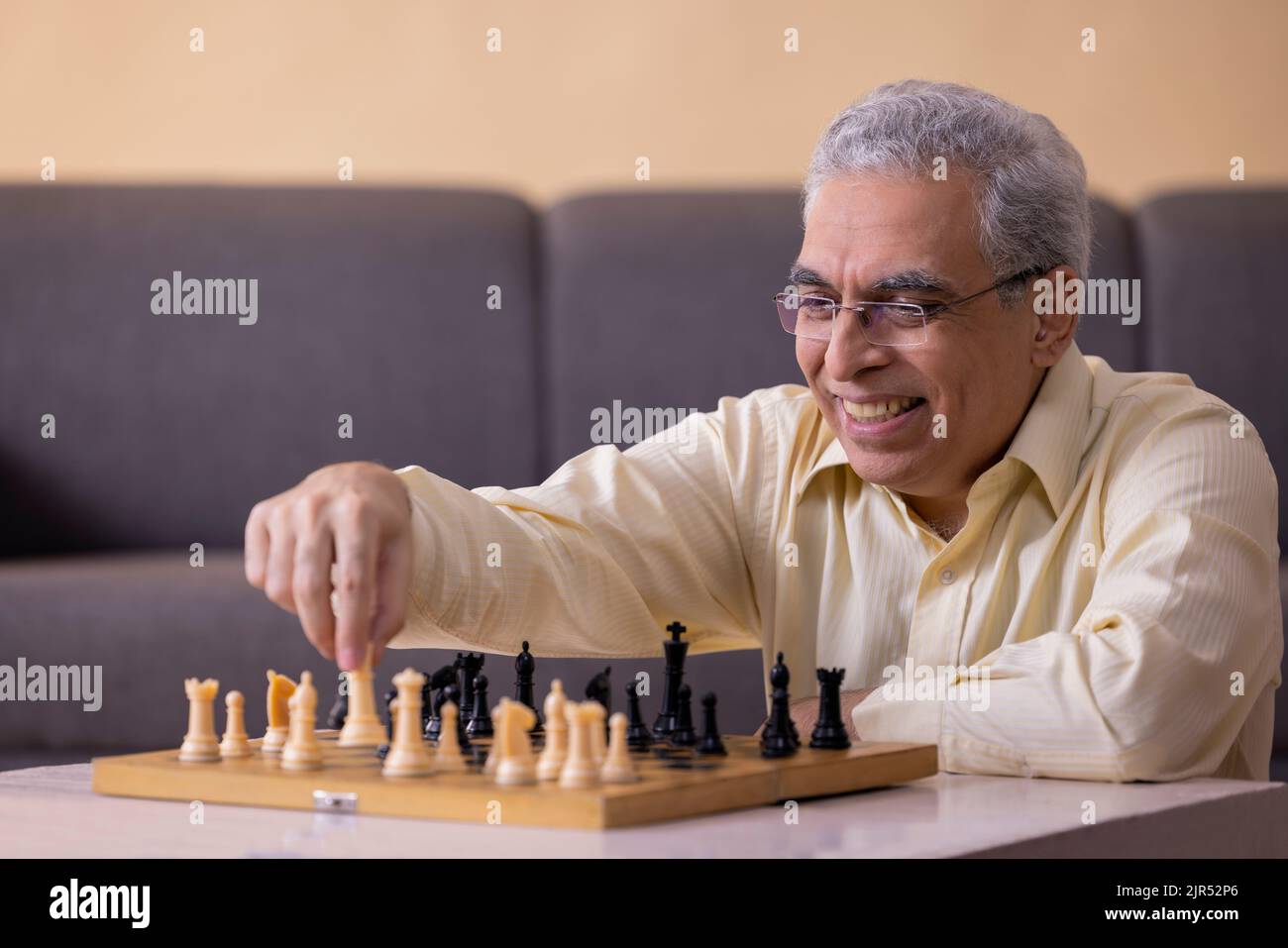 Indian man playing chess hi-res stock photography and images - Alamy