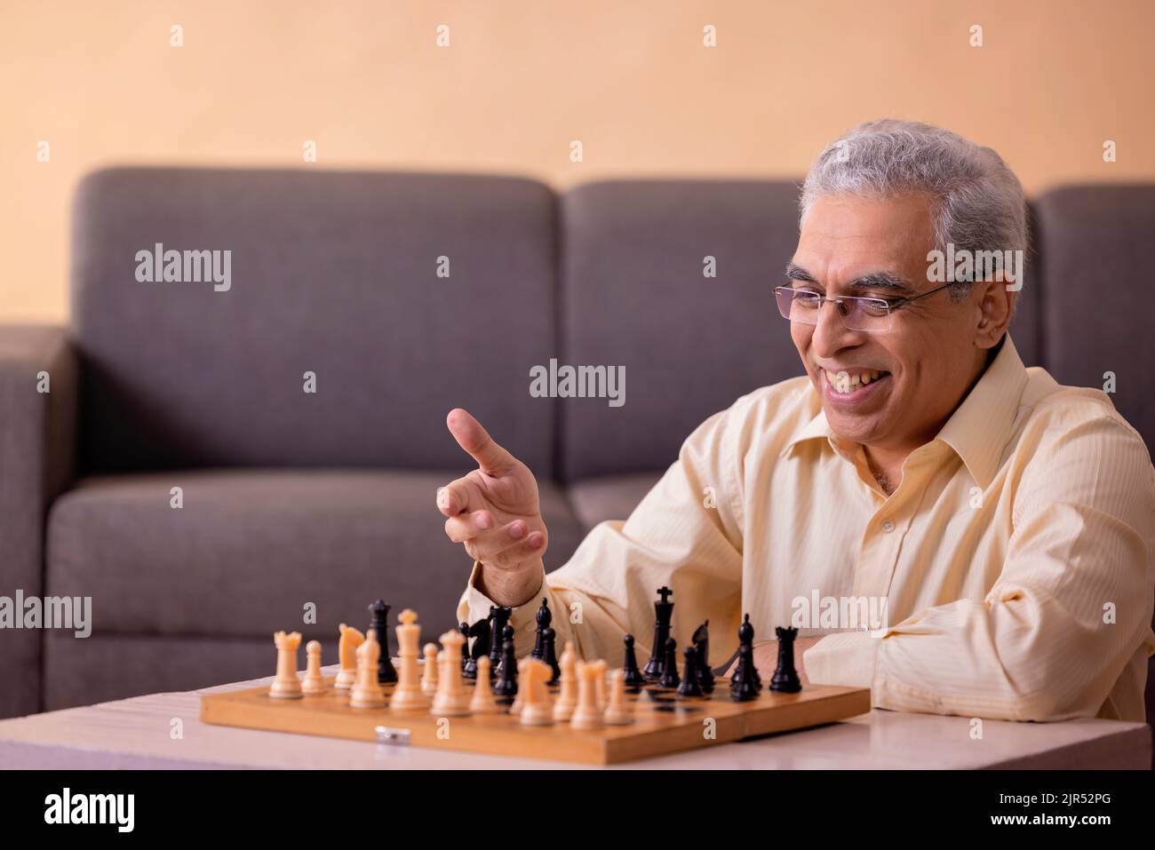 Indian man playing chess hi-res stock photography and images - Alamy