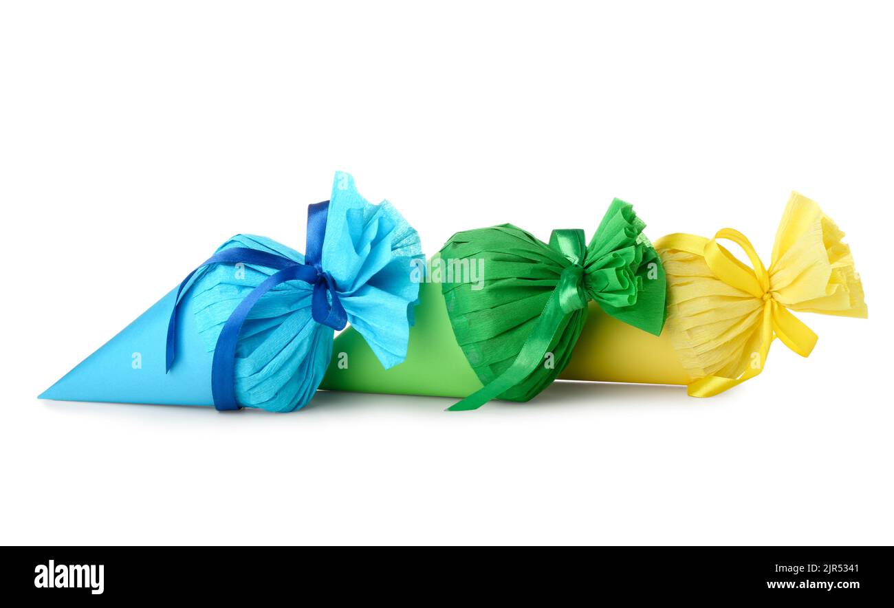 Colourful school cones on white background Stock Photo - Alamy