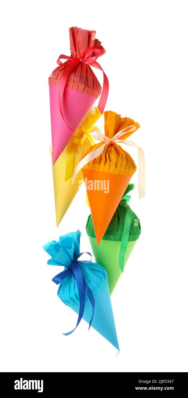 Colourful school cones on white background Stock Photo - Alamy