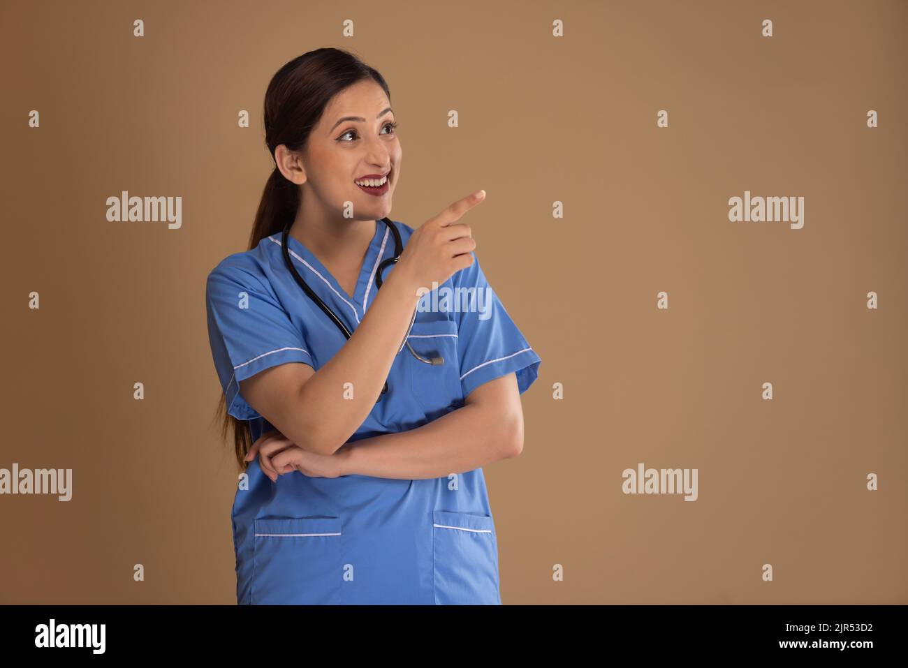 Nurse pointing finger hi-res stock photography and images - Alamy