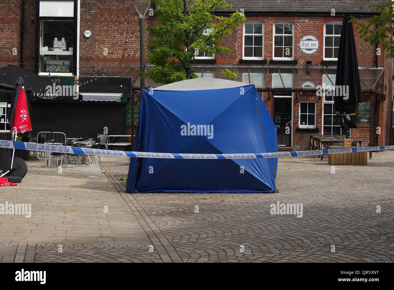 A police tent at the scene on Railway Street in Altrincham, Trafford ...