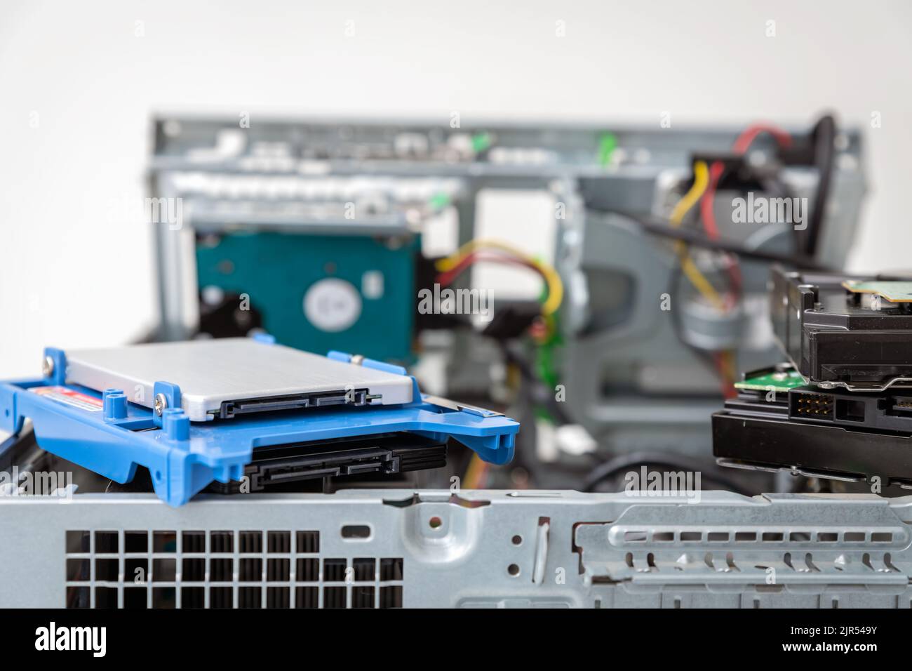 Closed-up view of SSD hard disk drives on top of business desktop PC ...