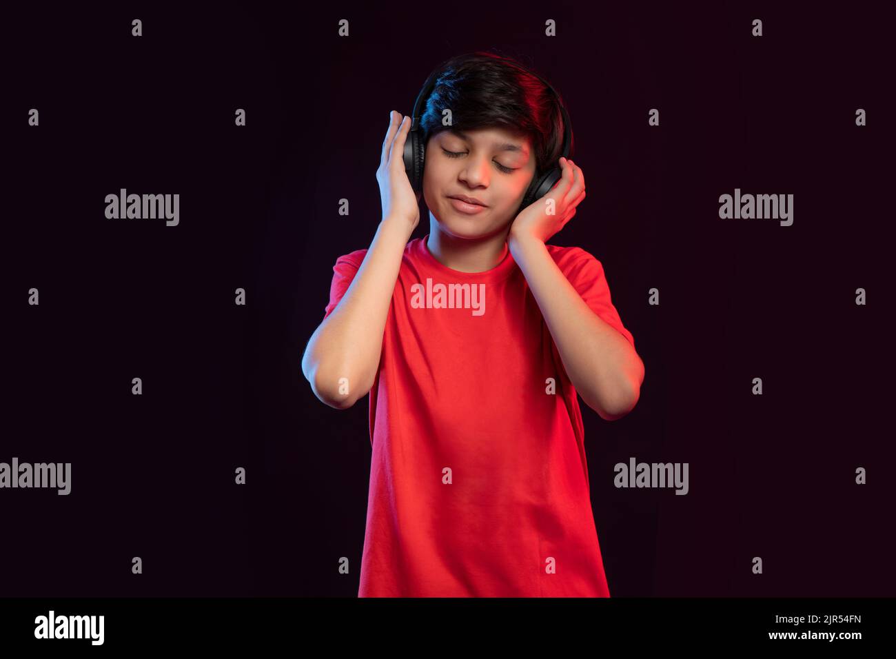 Boy eyes closed listening hi-res stock photography and images - Alamy