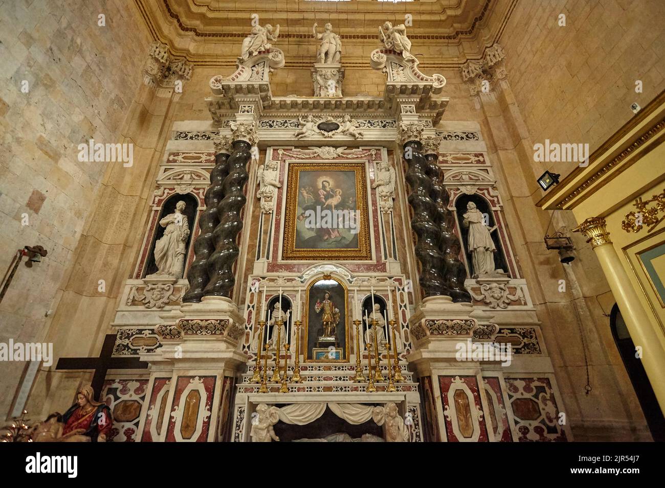 Marble altar inside a church in Cagliari with statues and religious ...