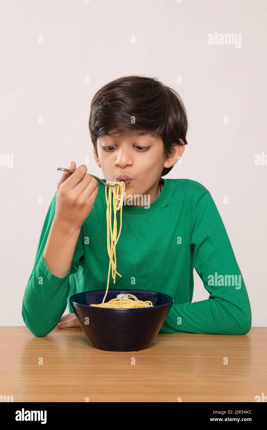 Asian boy noodles hi-res stock photography and images - Alamy