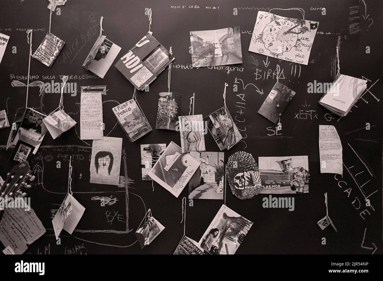 Backboard full of diagrams, notes and ideas for the realization of a ...