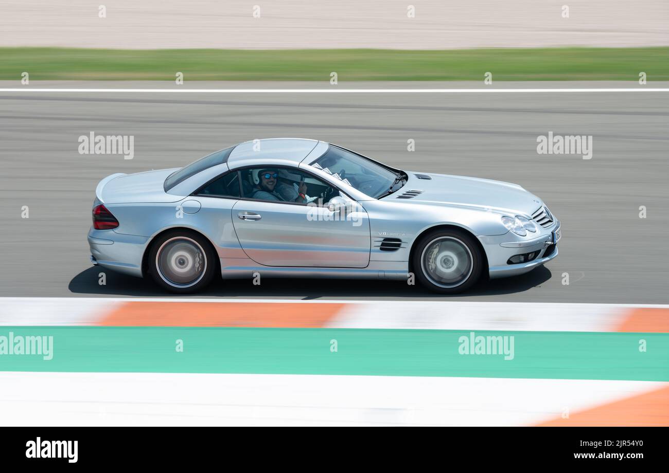 A Silver colored Mercedes Benz SL R230 on the race track Stock Photo ...