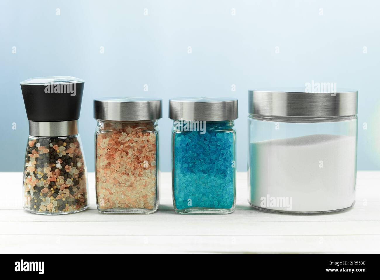 Salt in glass jars, different types of salt. Spa concept. Salt for ...