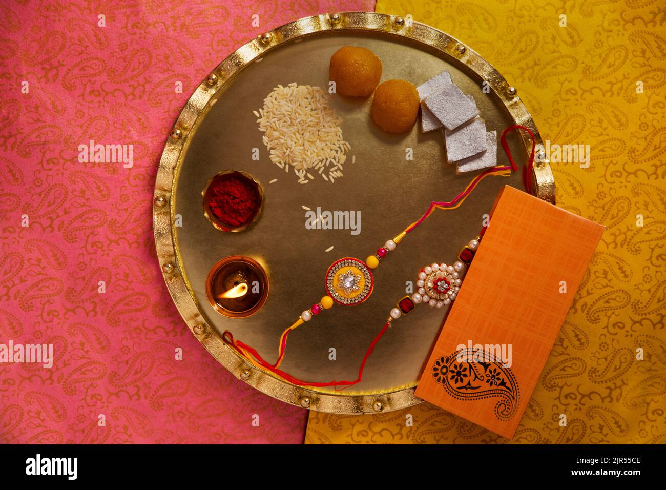 Rakhi kept in a decorative thali on the occasion of Rakshabandhan Stock ...