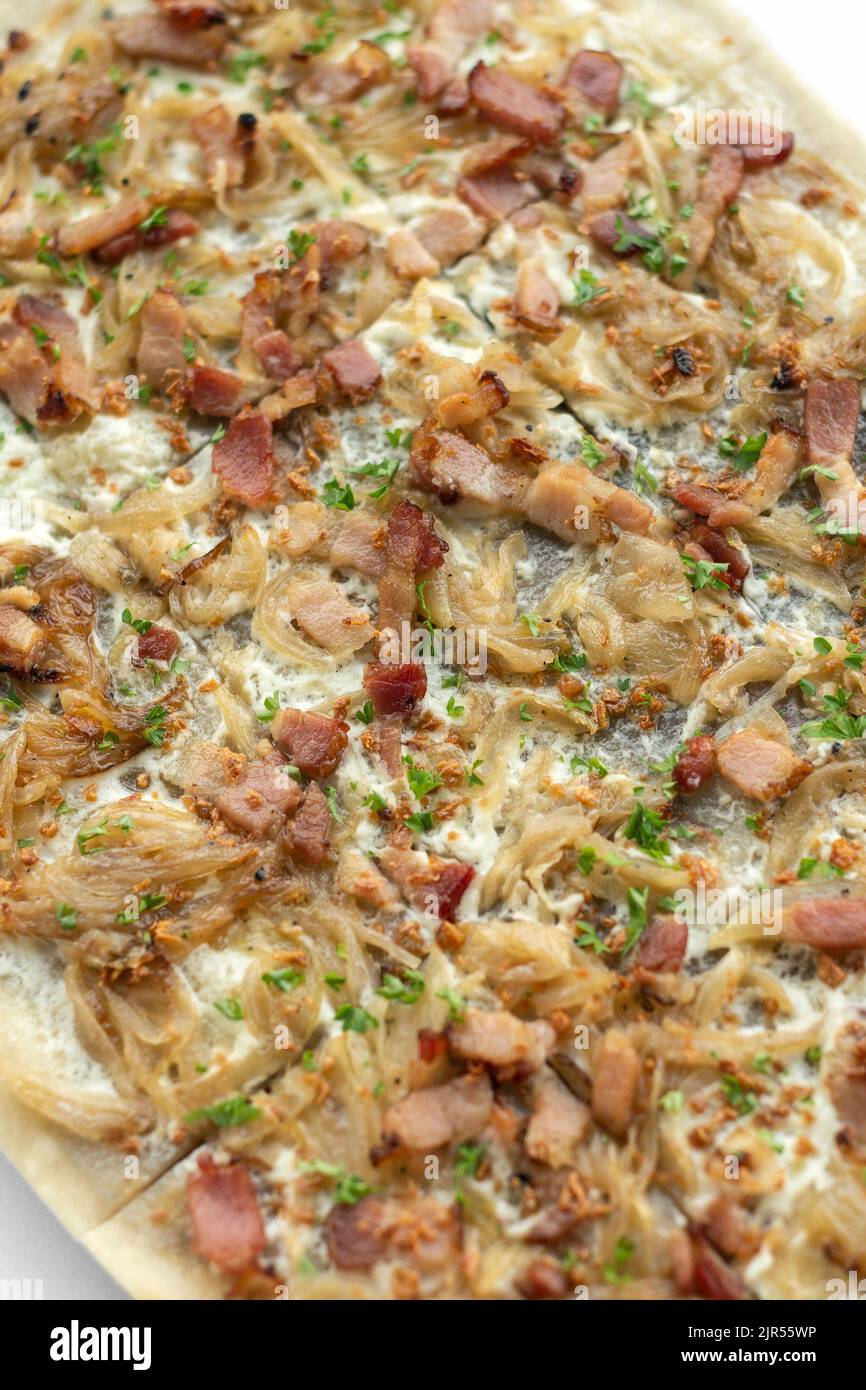Flammkuchen tarte flambee rectangular pizza with bacon and chicken on ...