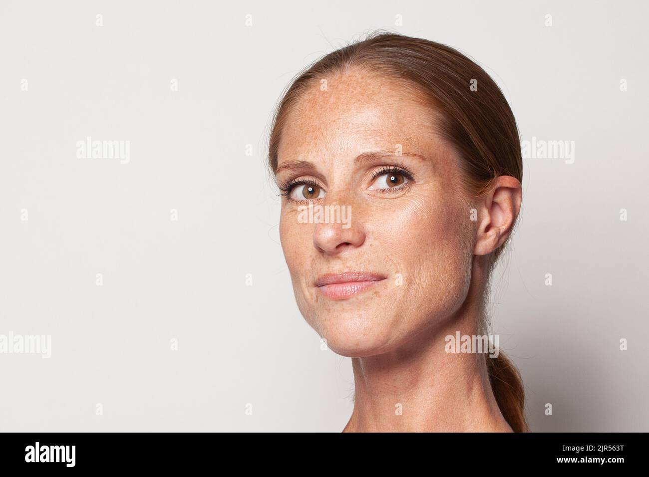 Beautiful adult woman face closeup portrait Stock Photo - Alamy