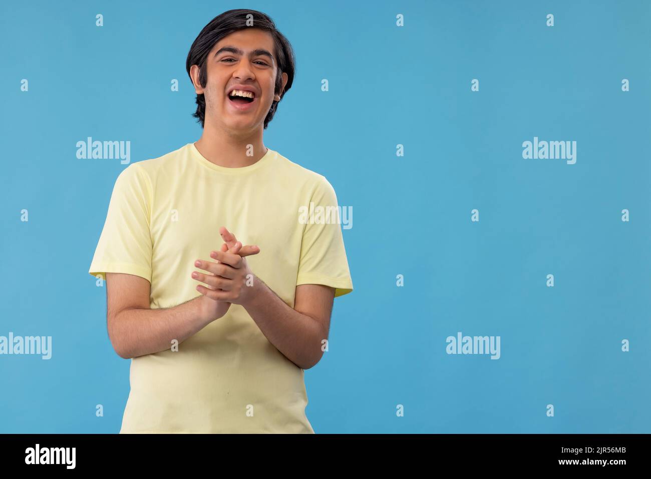 Boy clapping hands hi-res stock photography and images - Alamy