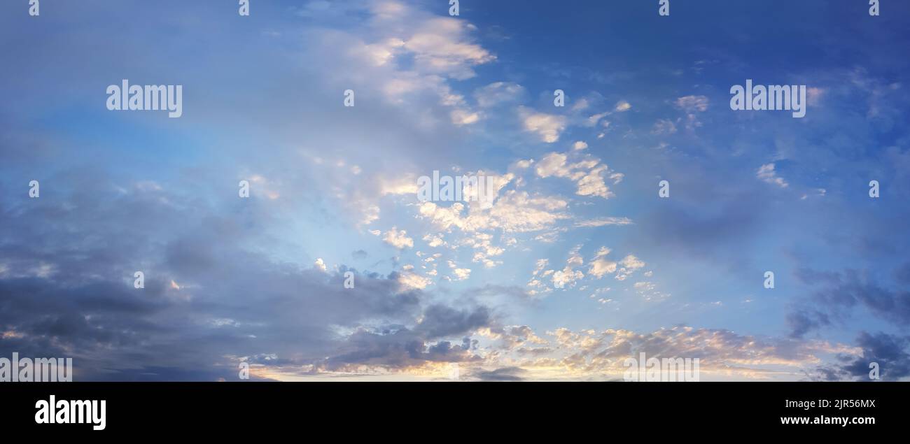Panoramic sky background. Sunset sky with clouds Stock Photo - Alamy