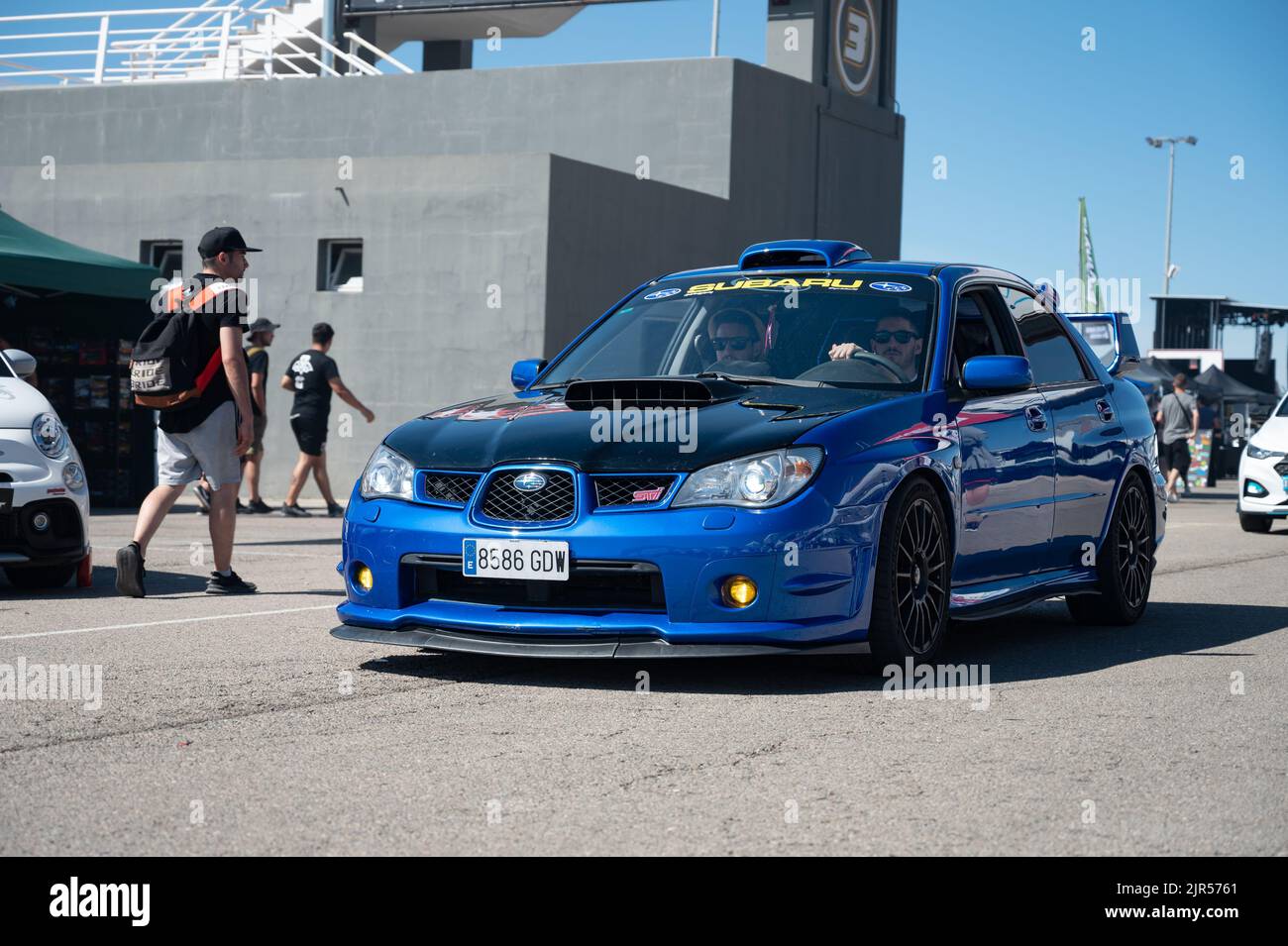 A Subaru Impreza second generation Hawkeye blue with black hood Stock Photo - Alamy