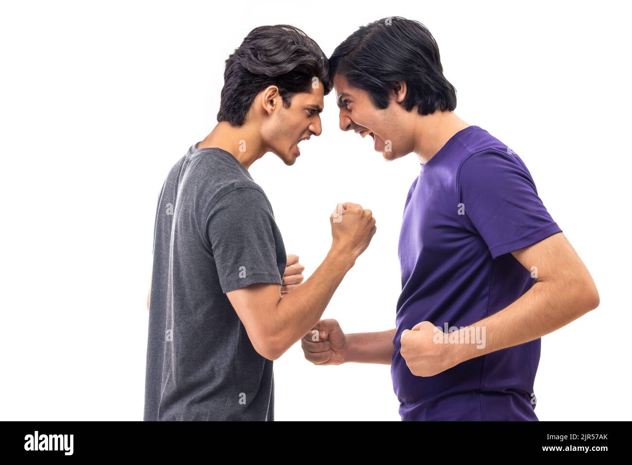 Portrait of two teenage boys fighting against pain background Stock ...
