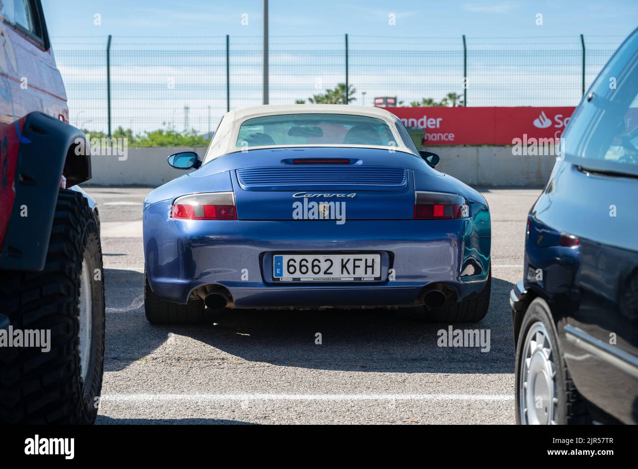 A blue Porsche 911 996 parked on street Stock Photo - Alamy