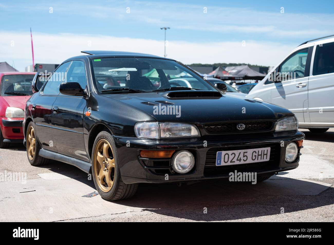 A black Subaru Impreza first generation parked on the street Stock ...