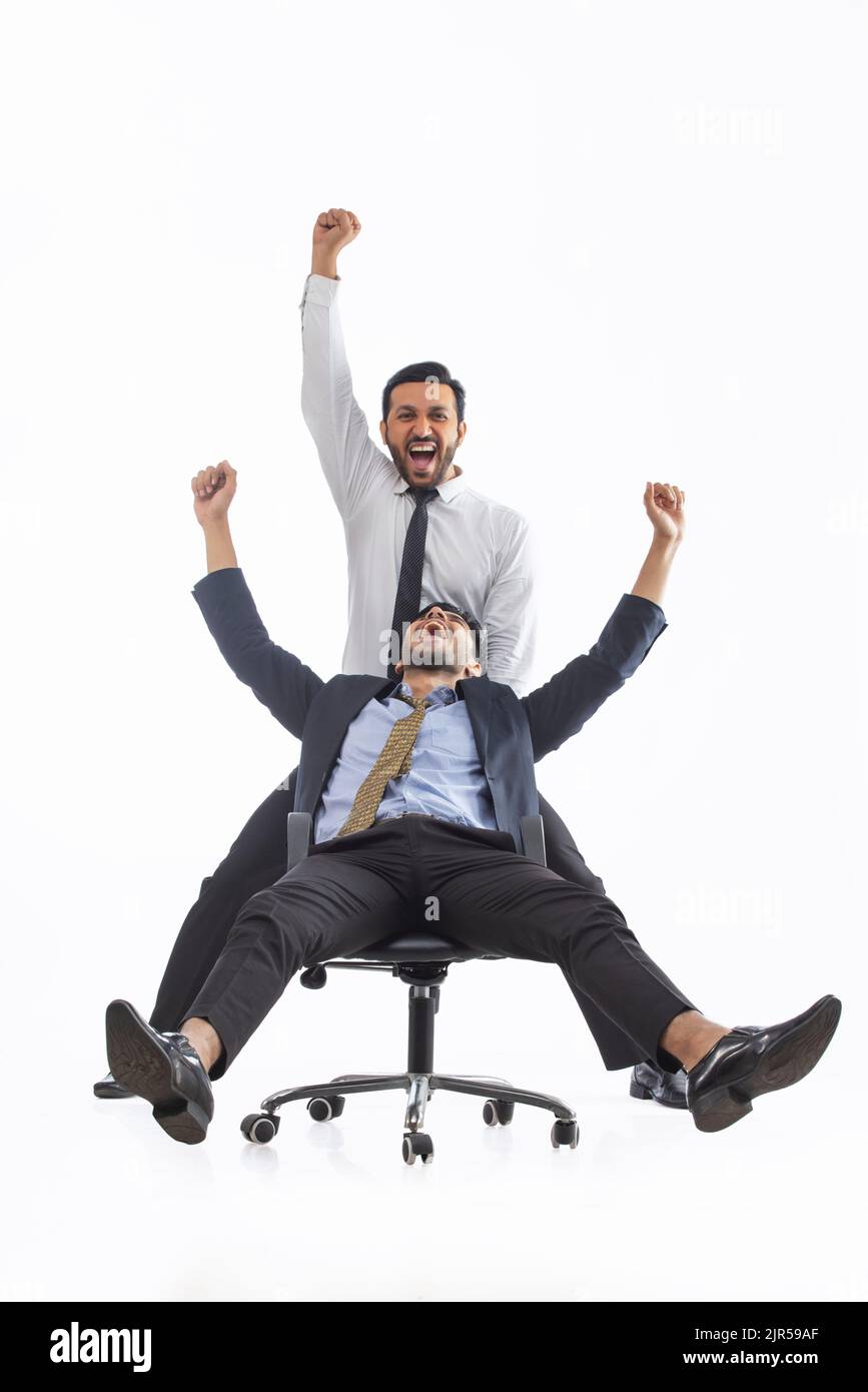Corporate employee in formal clothing ecstatic as they celebrate their ...