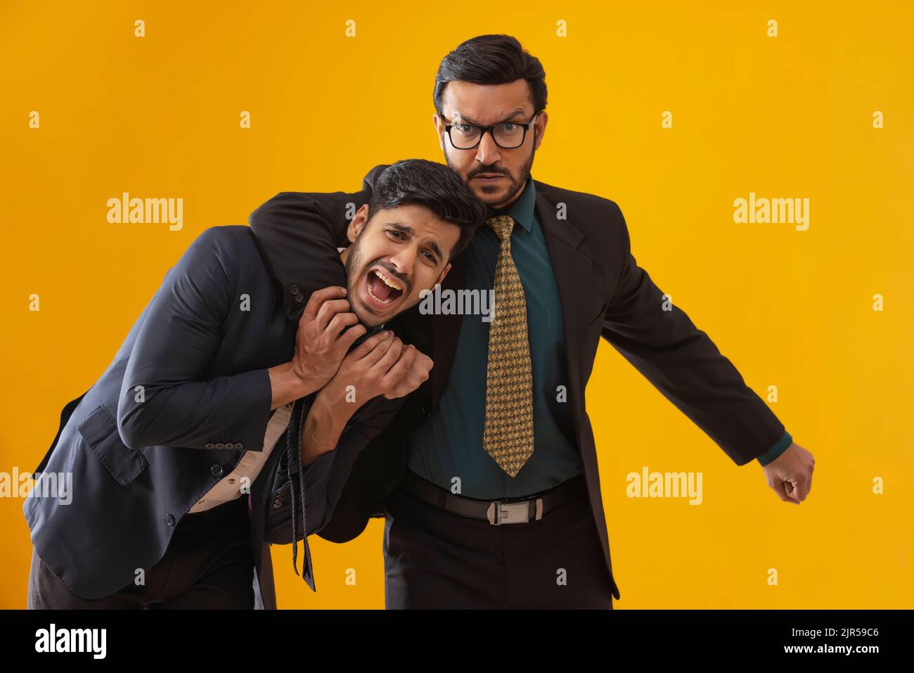 Corporate employees in formal business suit with one wrapping his hand ...