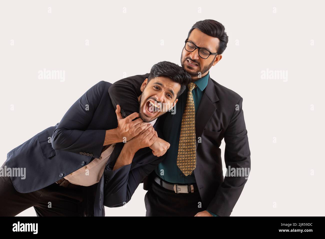 Corporate employees in formal business suit having fun with one ...