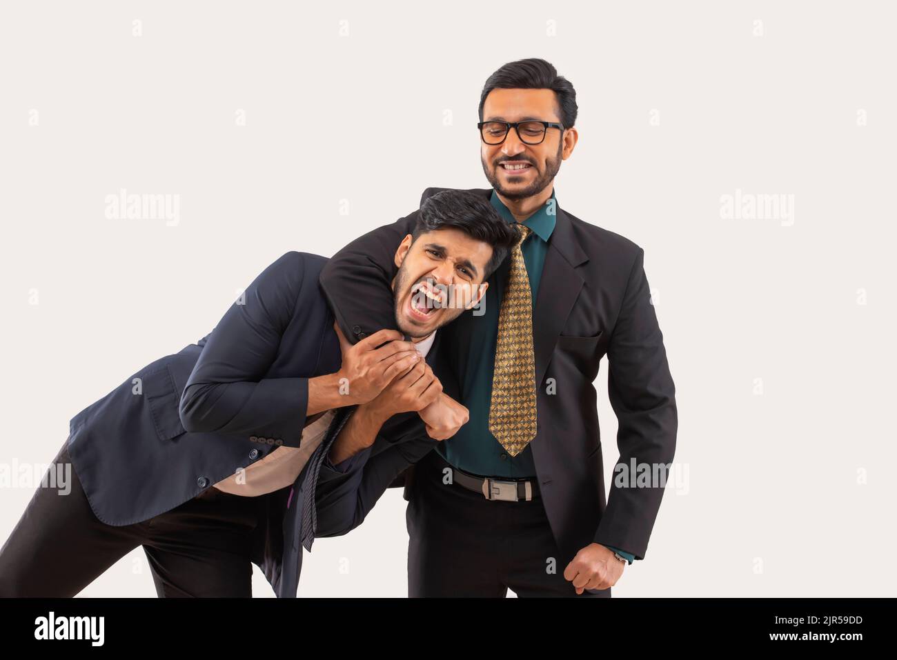 Corporate employees in formal business suit having fun with one ...