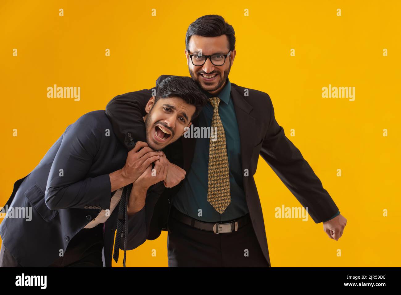 Corporate employees in formal business suit having fun with one ...