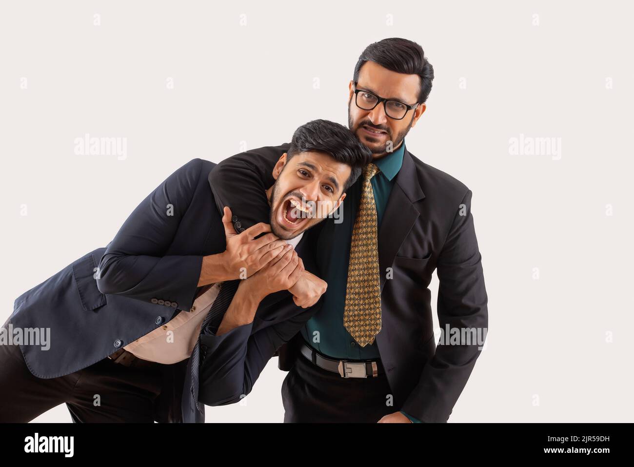 Corporate employees in formal business suit having fun with one ...