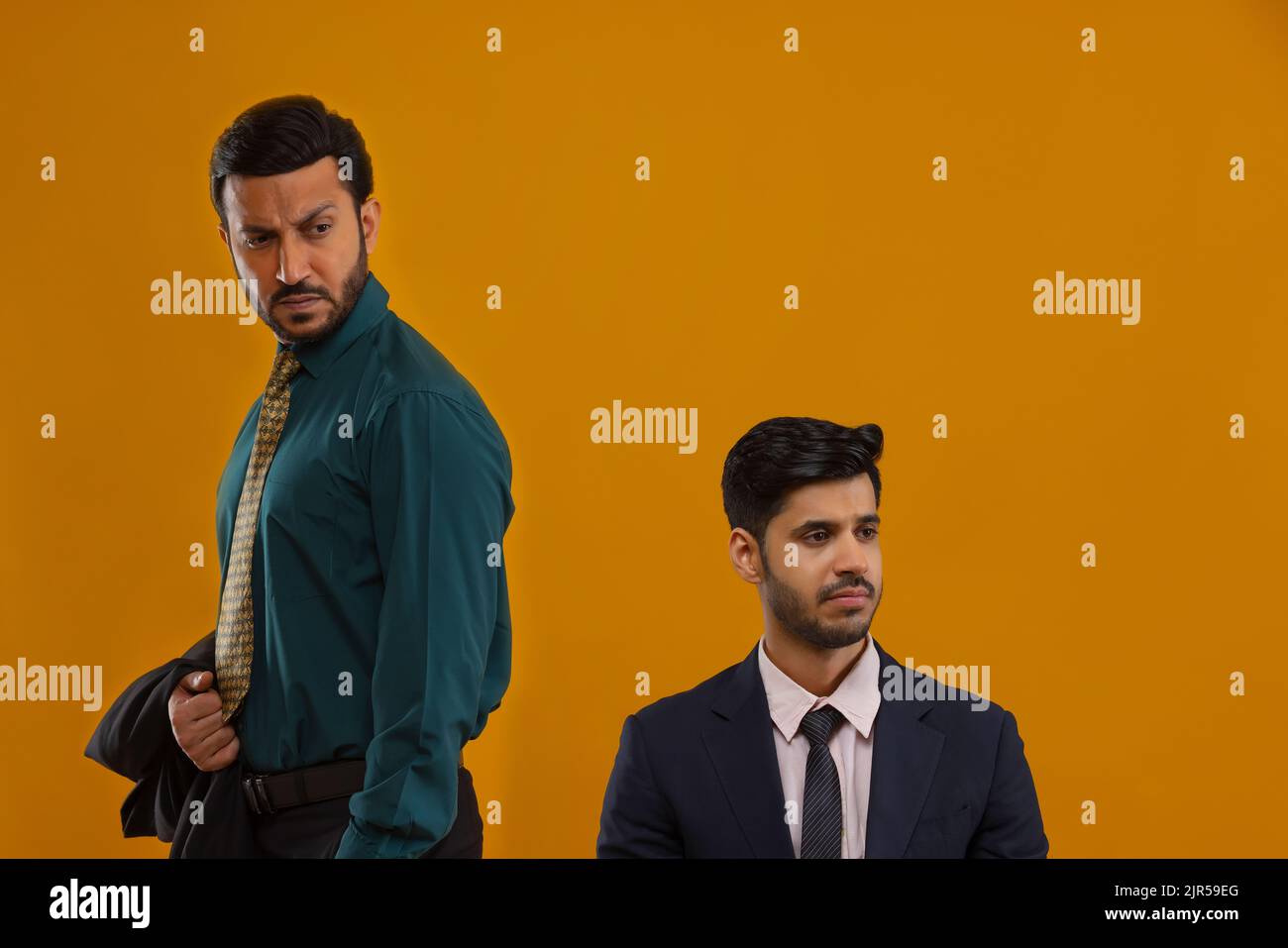 Corporate employee in formal clothing at social distance against plain ...