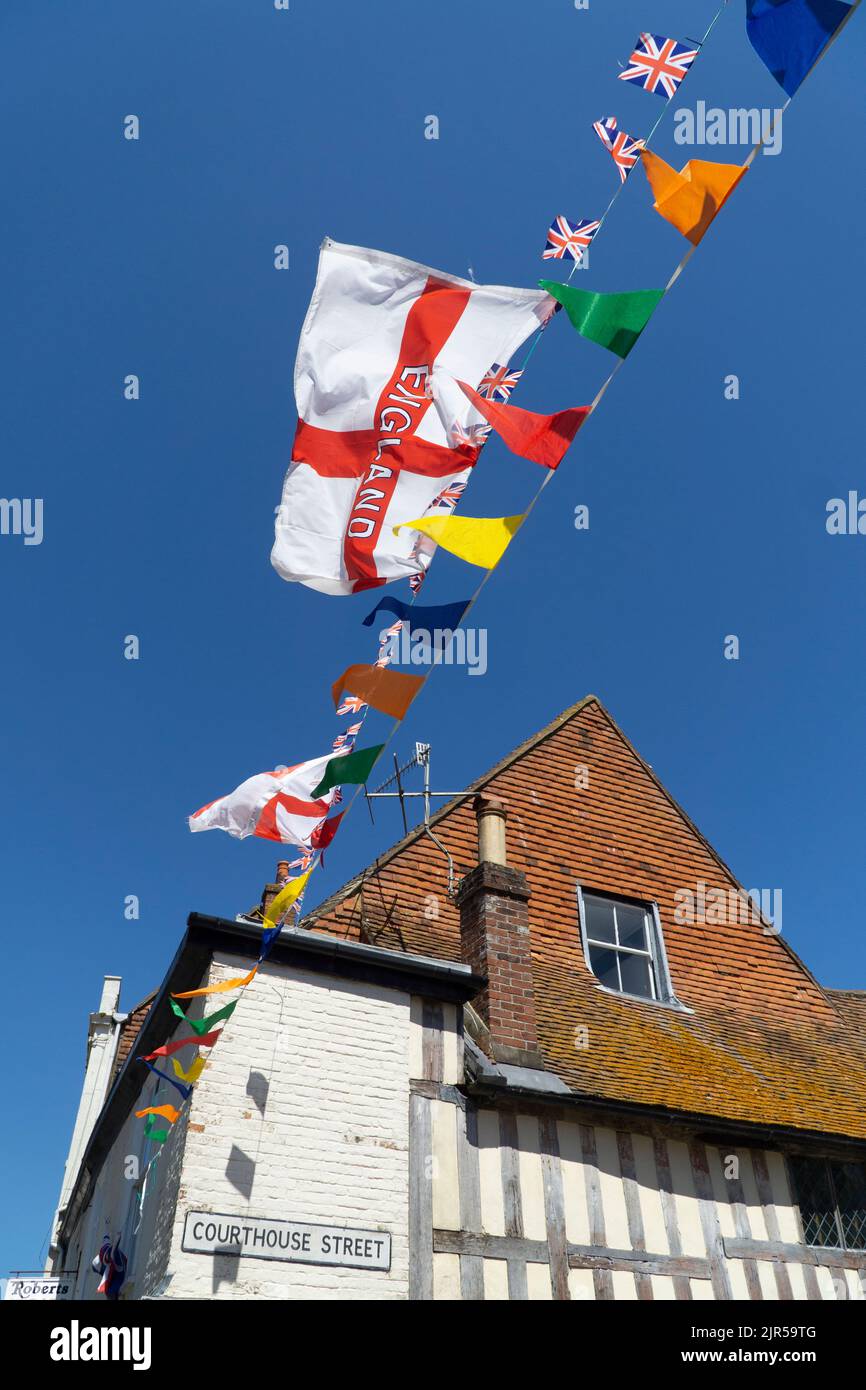 Bunting England flags strung from building historic town centre ...