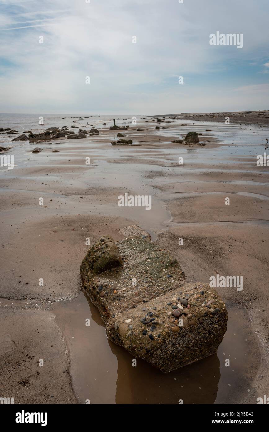 Ruined and eroded bits of road surface and military buildings on Spurn ...