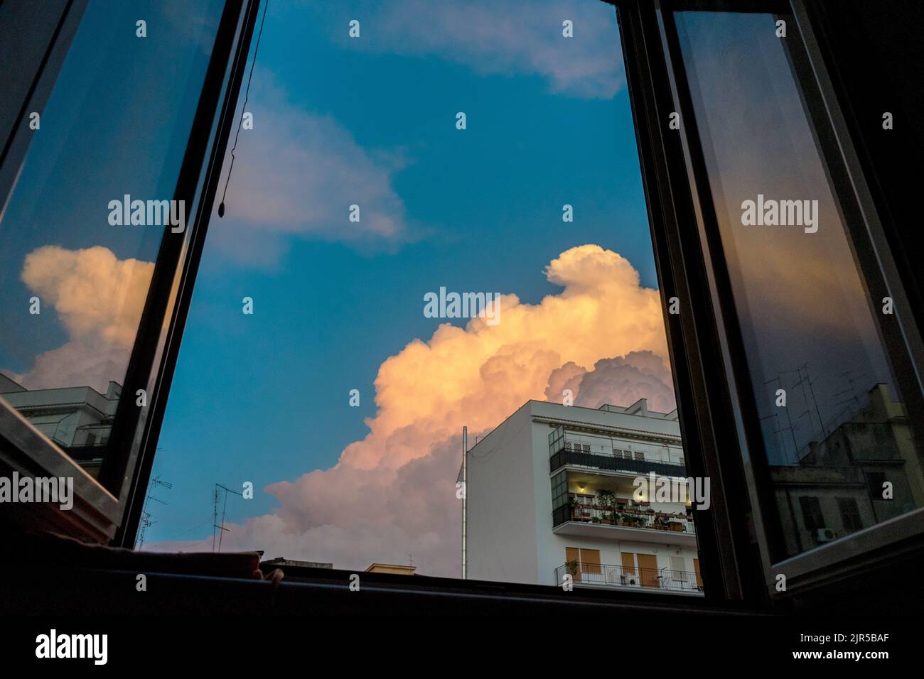 Rome, Italy: clouds hang over the buildings in east Rome Stock Photo ...