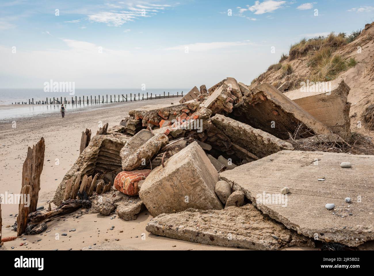 Ruined and eroded bits of road surface and military buildings on Spurn ...