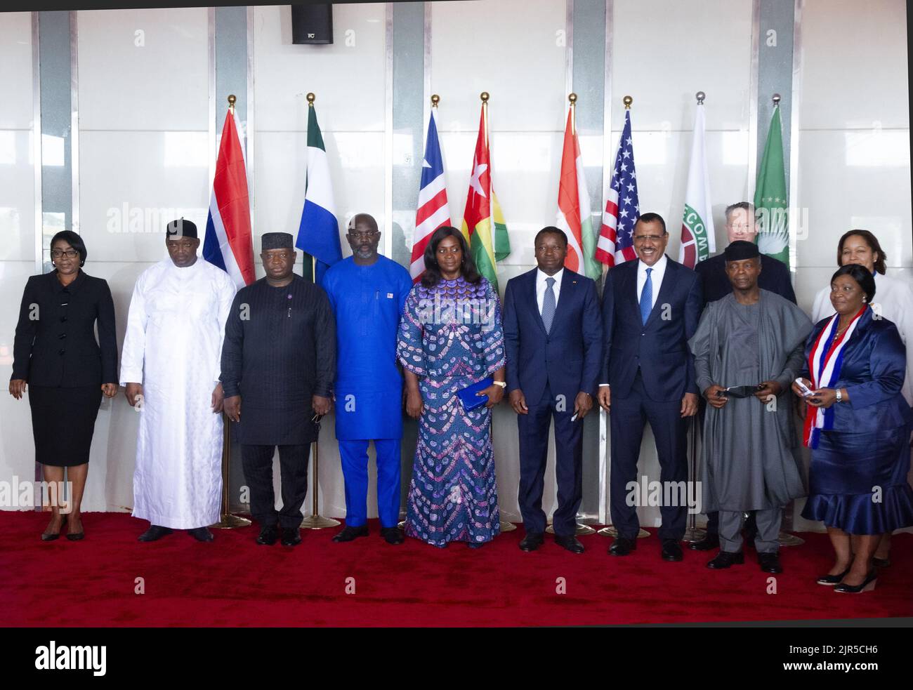 The Liberian president (C) poses with his counterparts and their ...