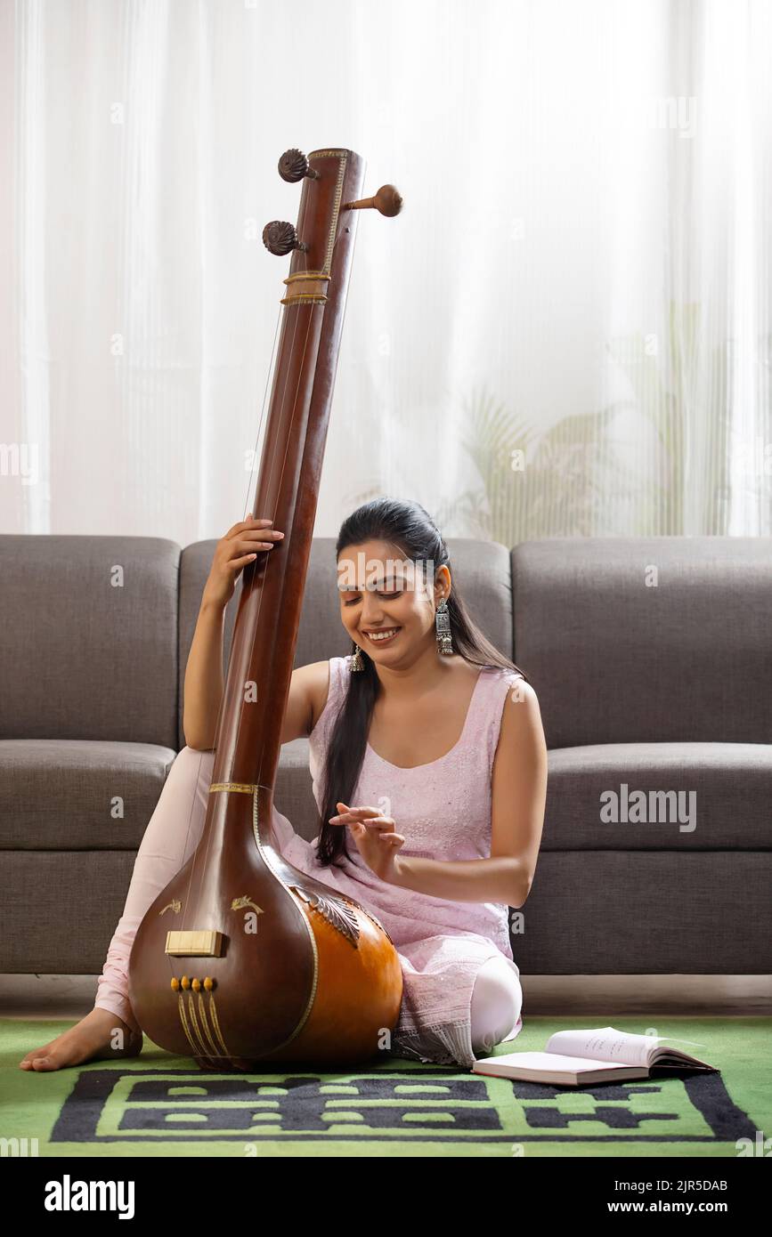 Portrait indian classical musician playing hi-res stock photography and ...