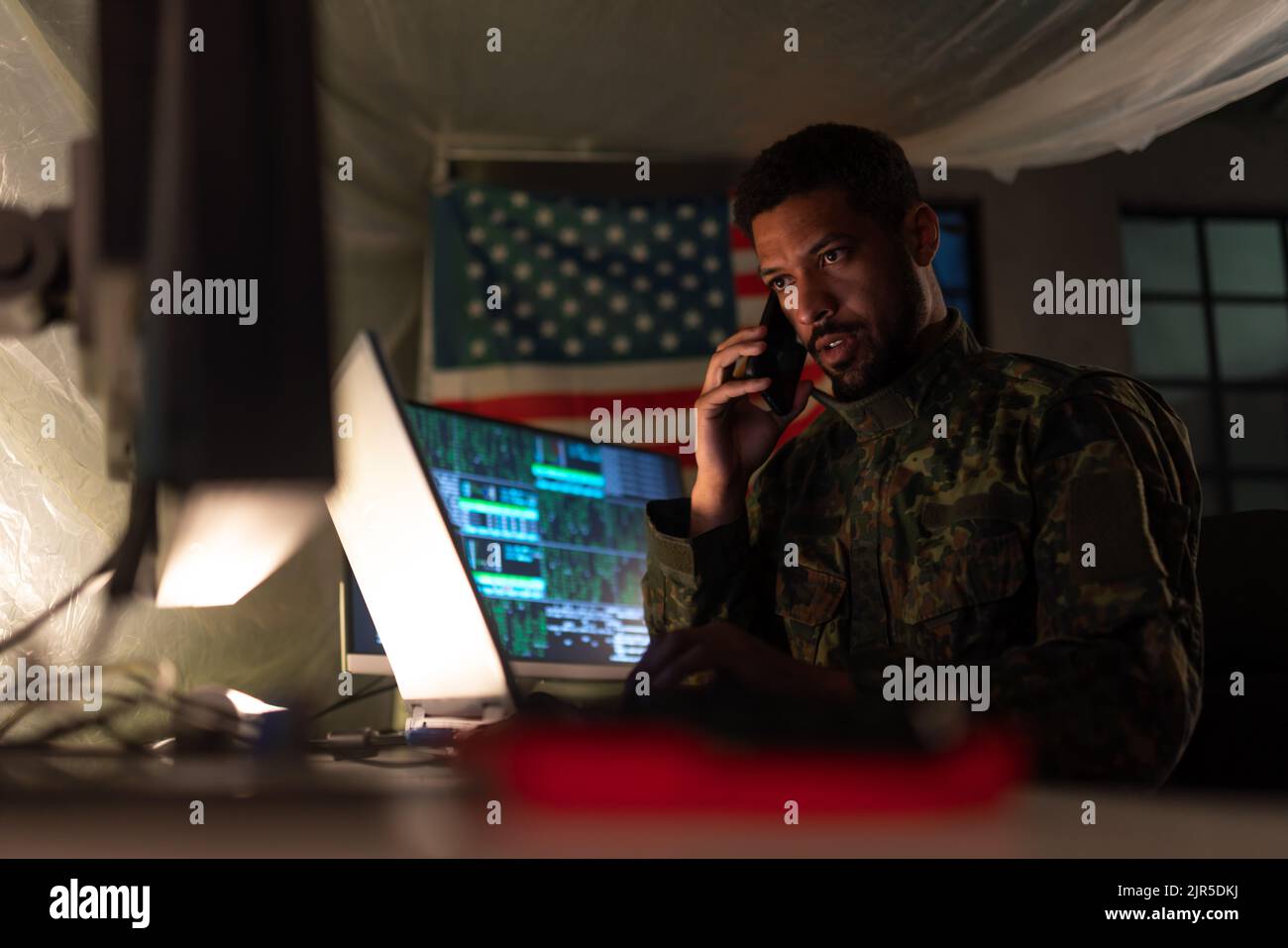 American hacker in military unifrorm on dark web, cyberwar concept ...