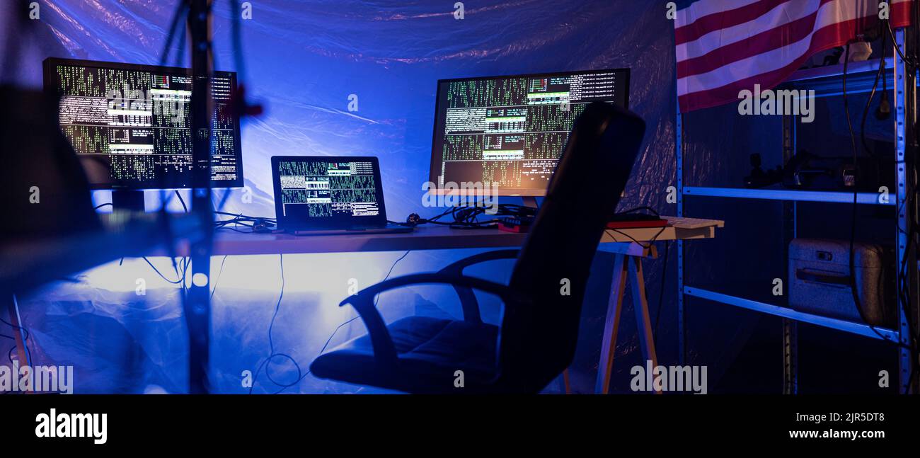Internet hacker workplace in dark office, cyberwar concept Stock Photo ...