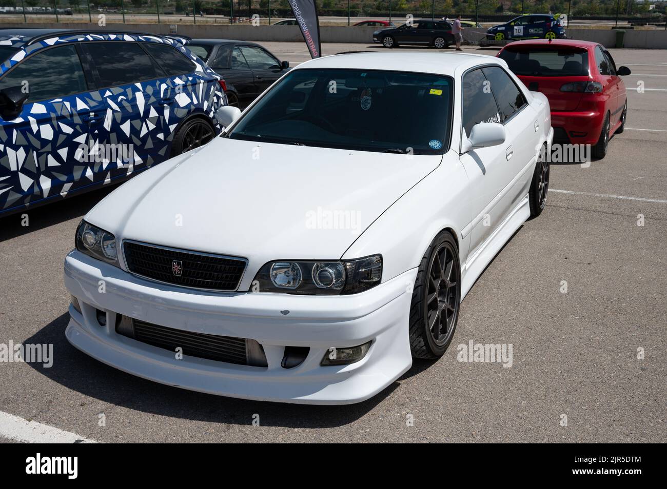 A white Toyota Chaser sports car parked on the street Stock Photo - Alamy