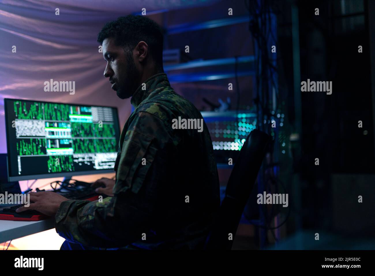 American hacker in military unifrorm on dark web, cyberwar concept ...