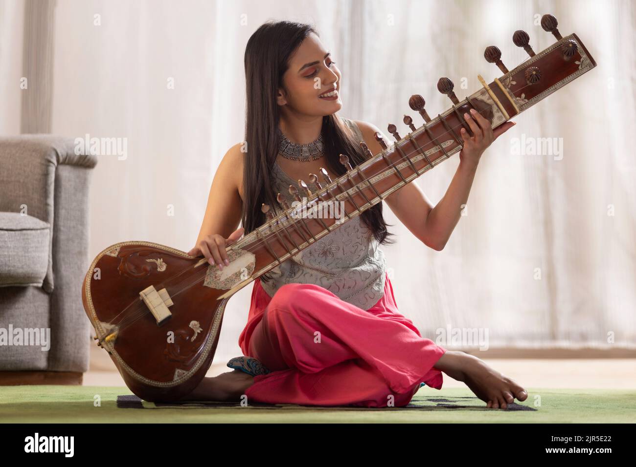 Portrait indian classical musician playing hi-res stock photography and ...